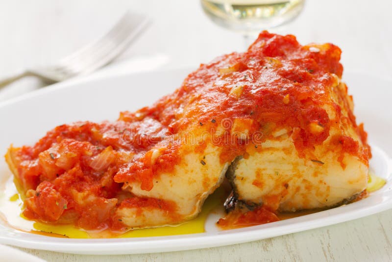 Cod Fish with Tomato Sauce on White Dish Stock Image - Image of ...