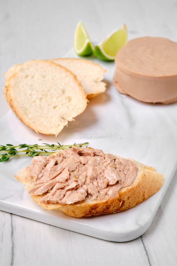 Cod Liver on Toast on Marble Serving Plate Stock Photo - Image of slice ...