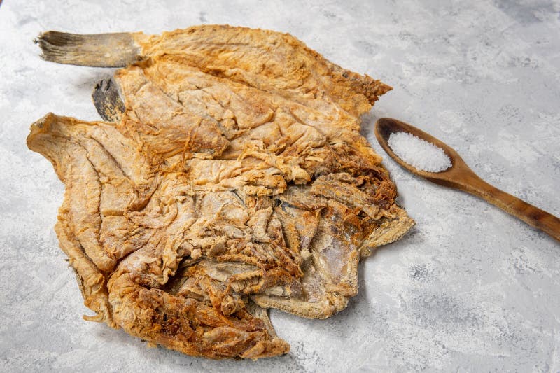 Cod Preserved in Salting on a Light Textured Surface Stock Photo ...