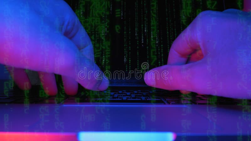 Coder Hacker Is Testing Virus Security System In Dark Working Room