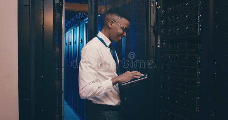 Coding, Engineer and Man with Tablet, Server Room and Happy for Network ...