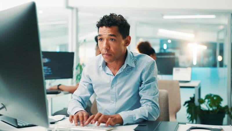 Coding, Man and Typing on Computer in Office for App Development, Software Maintenance and ...