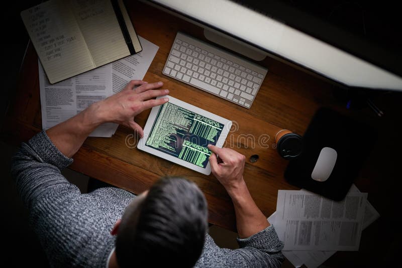 Coding through the Night. High Angle Shot of an Unidentifiable Computer ...