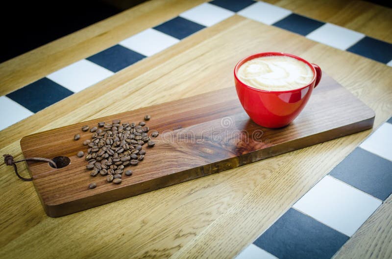 Coffe Cup with Beans on Wooden Plate Stock Image - Image of coffe ...