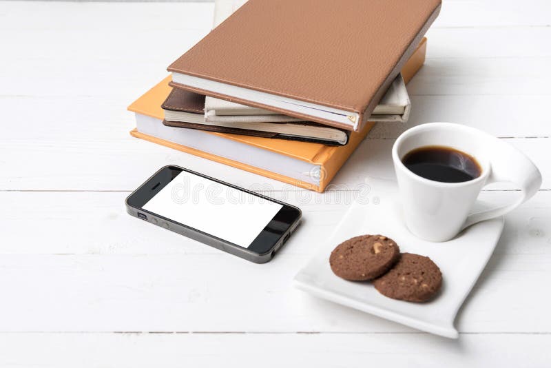 Coffe Cup with Cookie,phone and Stack of Book Stock Photo - Image of ...