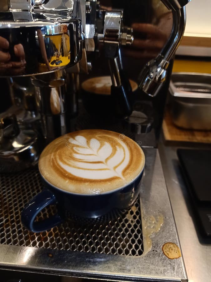 Coffee with coffee engine stock photo. Image of latte - 261683476