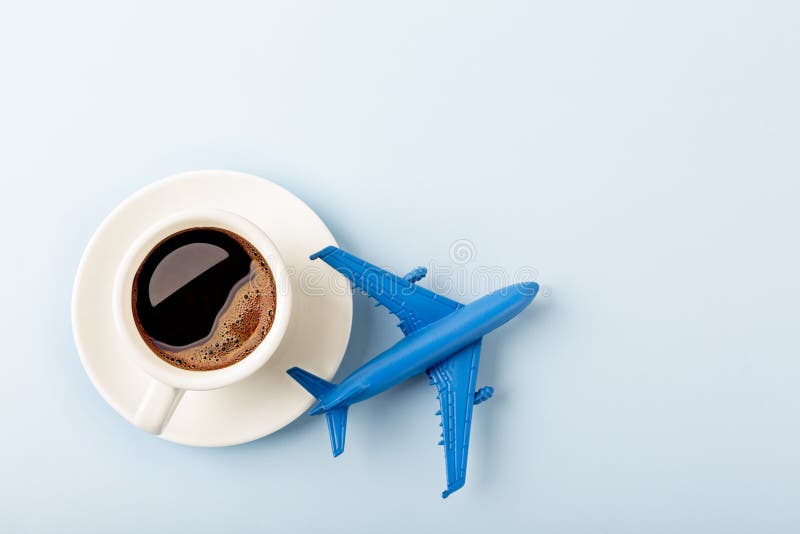 Coffee with Airplane Model on Blue Background Stock Image - Image of ...