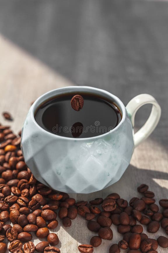 Coffee Bean Fall in Cup of Coffee Lifestyle Stock Image - Image of bean ...