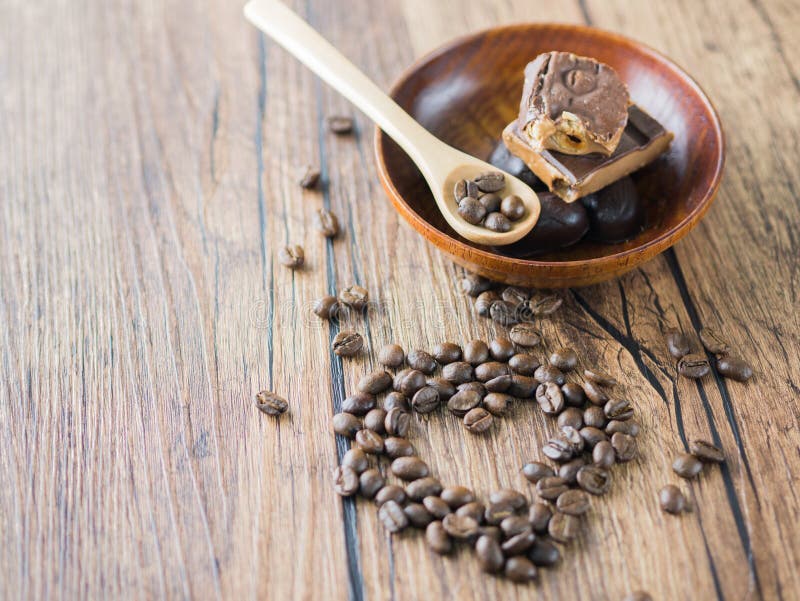Coffee Beans Arranged Heart Figure with Spoon and Chocolate Bars Stock ...