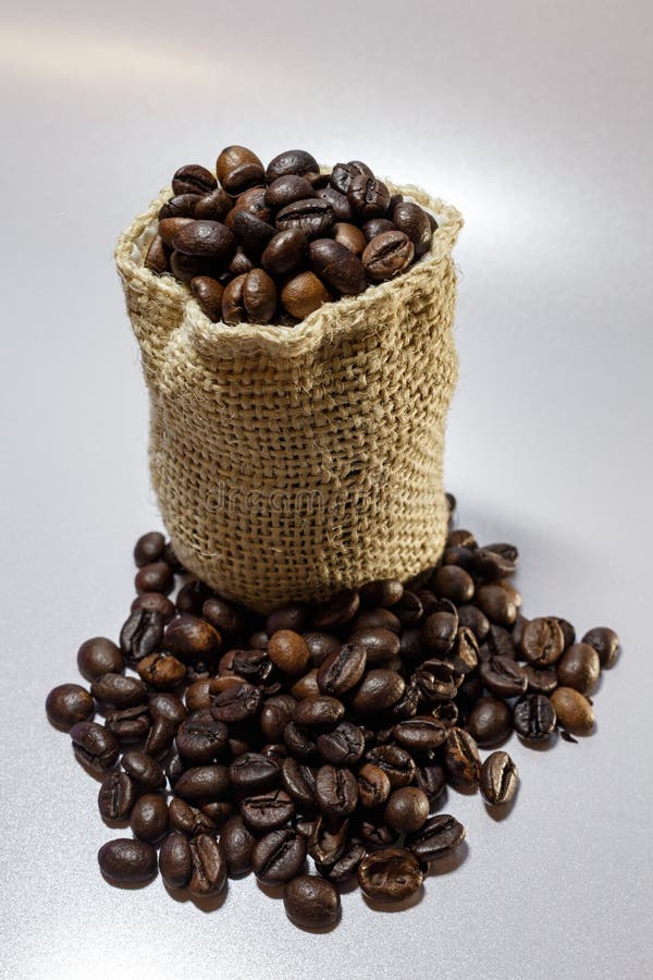 Coffee beans in the bag stock image. Image of flower - 202425905