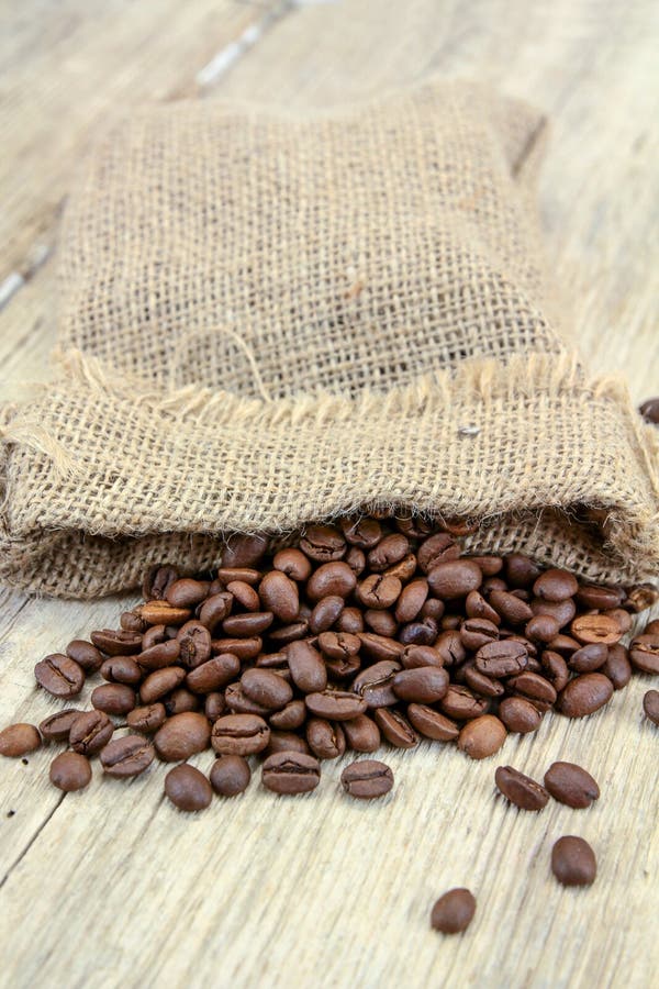 Coffee beans in a bag stock photo. Image of seed, dark - 162569624