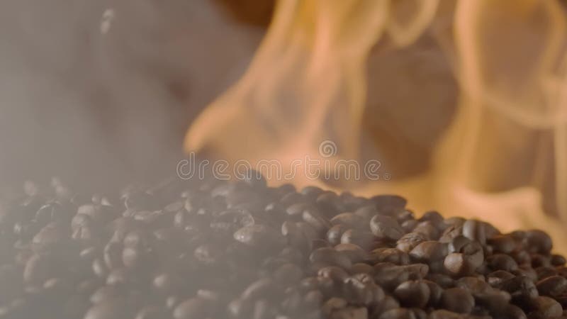 Coffee Beans Being Roasted on a Black Studio Background. Coffee ...