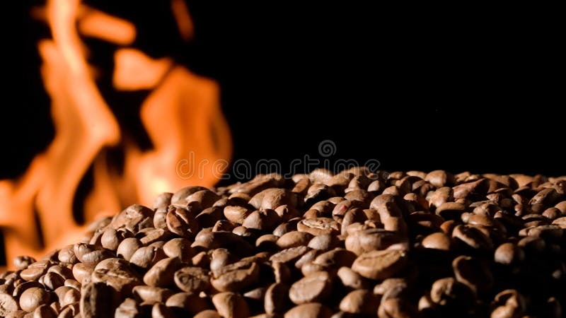 Coffee Beans on a Black Studio Background with Burning Tongues of Flame ...
