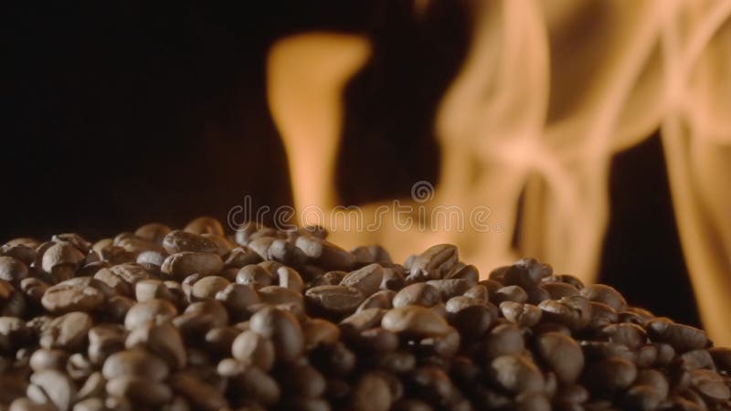 Coffee Beans on a Black Studio Background with Burning Tongues of Flame ...