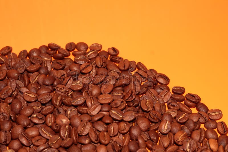 Coffee Beans on a Bright Background. Coffee Granules on an Orange Table ...