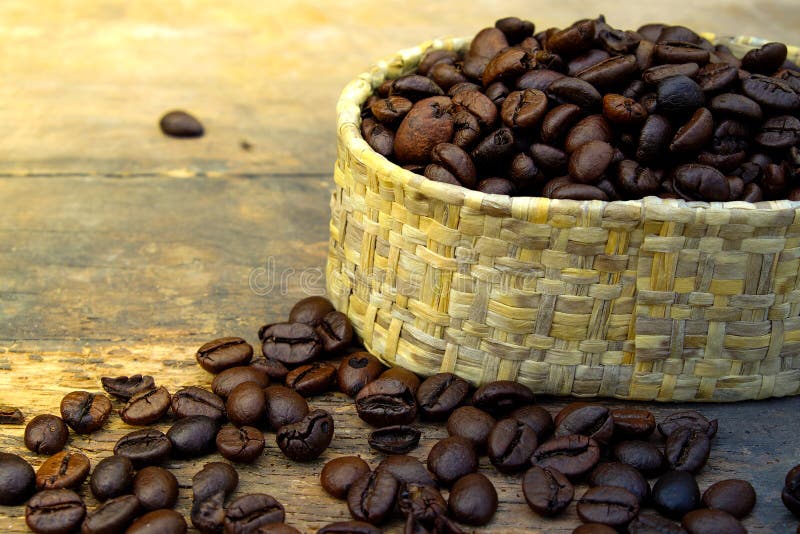 Coffee Beans in Bulk on Wood Table and a Soft Light Stock Image - Image ...