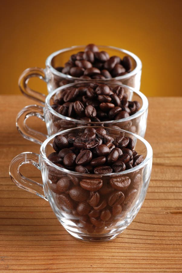 Coffee beans in the cup stock photo. Image of morning - 27767534