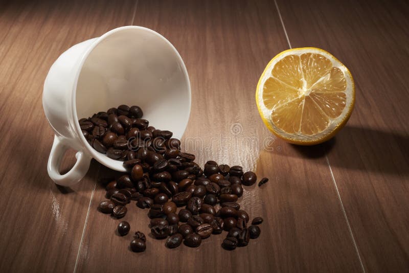 Coffee beans a cup, lemon stock photo. Image of cafe - 74700888