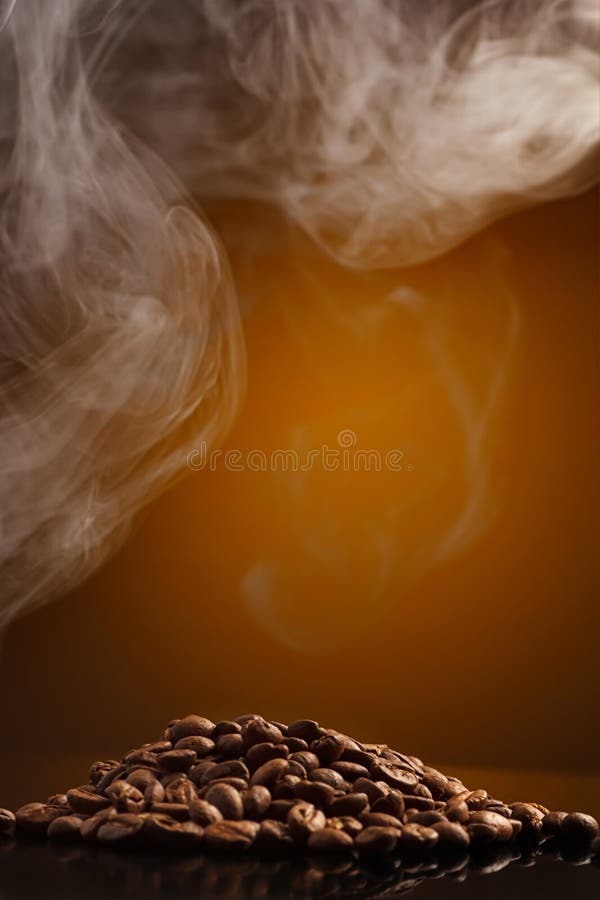 Coffee Beans on a Dark Background with a Yellow Highlight on the ...