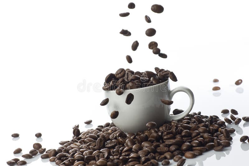 Dropping coffee beans stock photo. Image of caffeine - 16415450