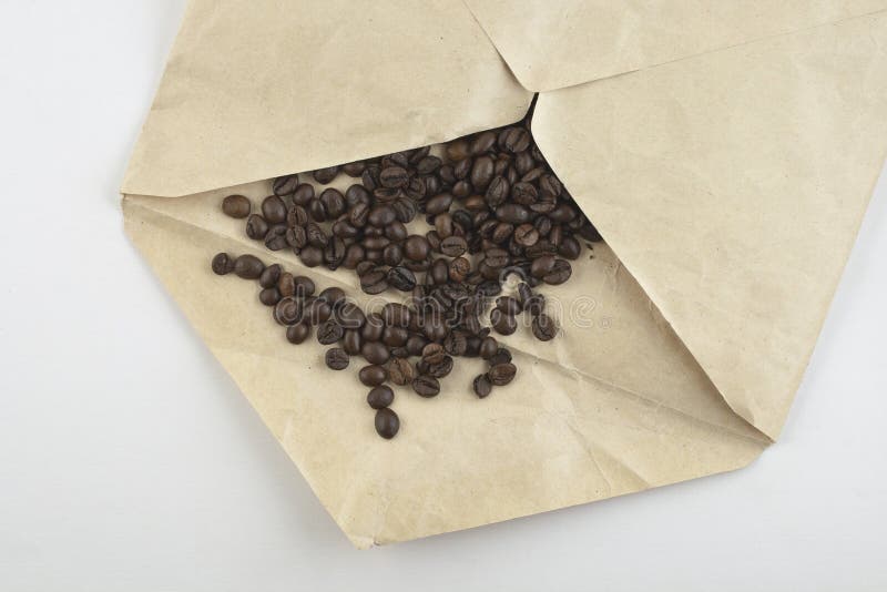 Coffee beans in envelope stock image. Image of aromatic - 20354307