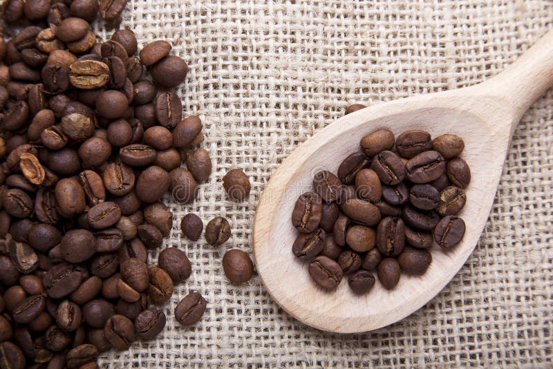 Coffee beans on fabric stock photo. Image of brown, sloseup - 23067756