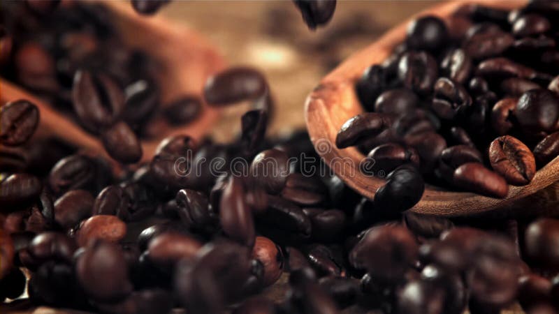 Coffee Beans Fall on the Table. Filmed on a High-speed Camera at 1000 ...