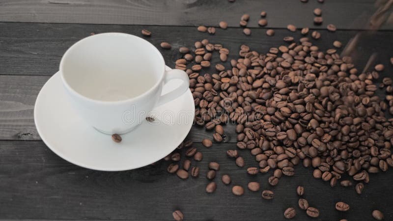 Coffee Beans Falling Down on a Table Stock Video - Video of table ...