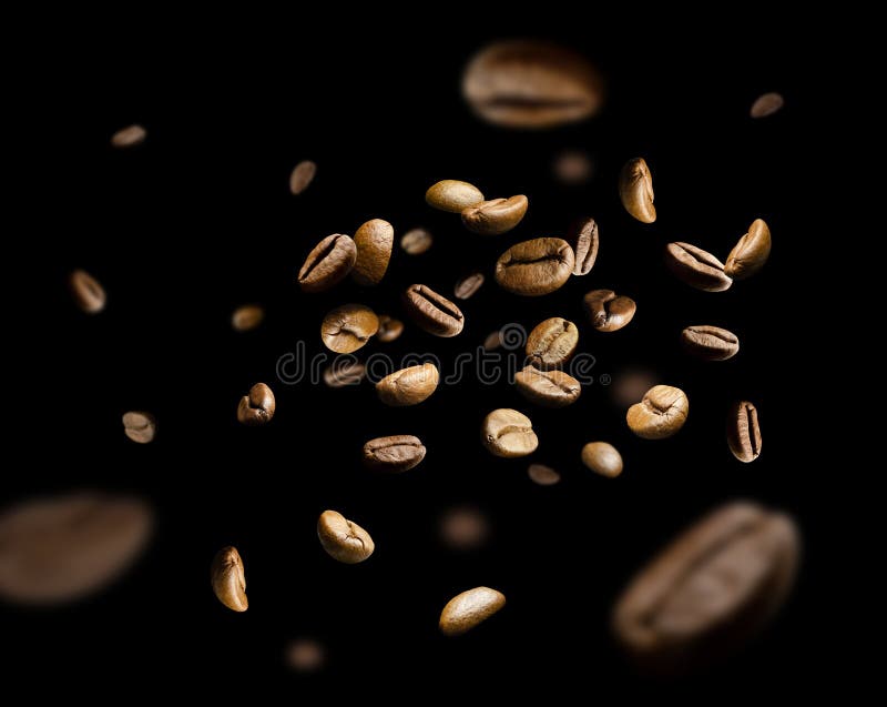 Coffee Beans Fly and Levitate in Space. Isolated on Black Stock ...