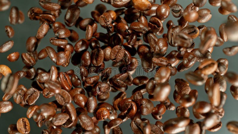 Coffee Beans Flying in the Air in Freeze Motion Stock Photo - Image of ...