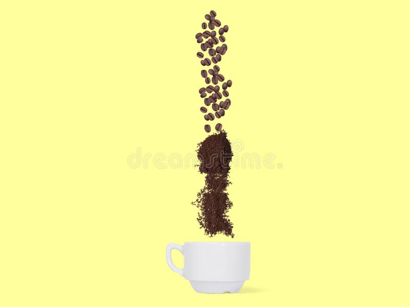 Coffee Beans and Ground Coffee Fall into the Cup. Stock Image - Image ...