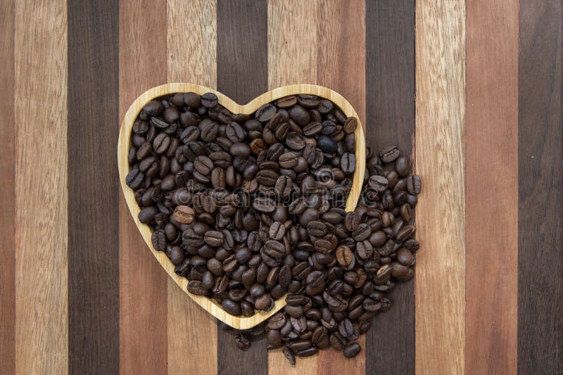 Coffee Beans in Heart-shaped Tra,y Representing Love of Coffee Stock ...