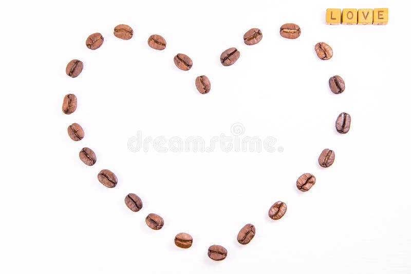The Heart Of Coffee Beans On A White Background With Inscription Love