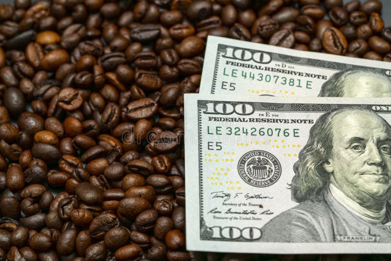 Coffee Beans and Hundred Dollar Bills Create a Rich Contrast Stock ...