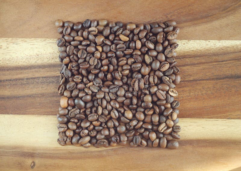 Coffee Beans Lie on a Wooden Board in the Shape of a Square. Stock ...
