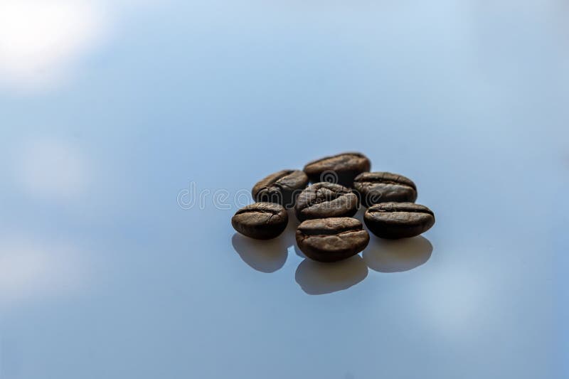 Coffee Beans on a Light Background. Roasted Coffee Bean Stock Photo ...