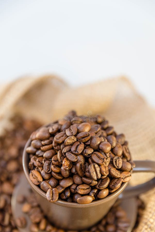 Coffee Beans and Coffee in a Mug Stock Image - Image of bean, delicious ...