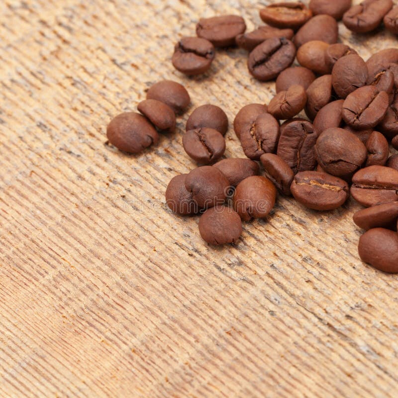 Coffee Beans Over Wooden Table - Close Up Shot Stock Photo - Image of ...