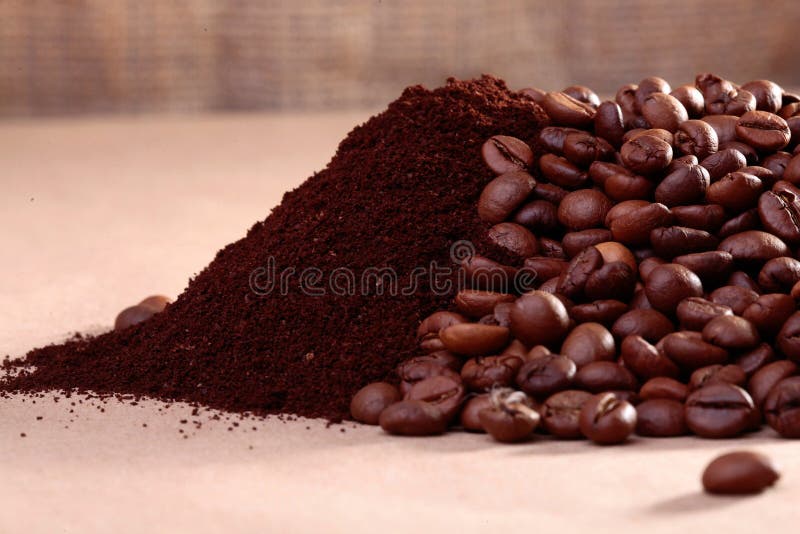 Coffee beans and powder stock image. Image of cafeteria - 51910981