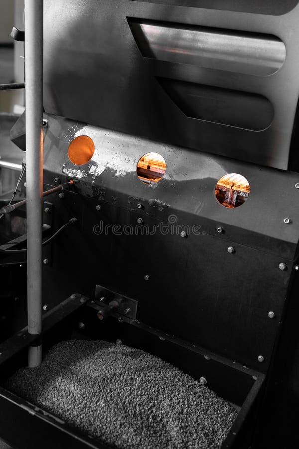 Coffee Beans Resting Under the Burner of a Roaster Machine Stock Photo ...