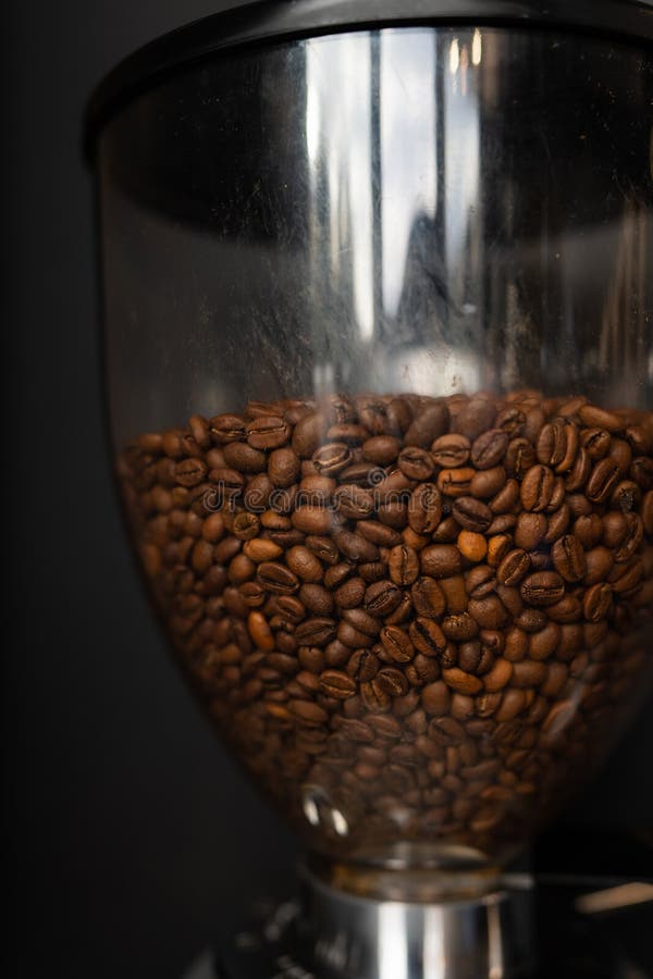 Coffee Beans Roasted and Poured into a Coffee Grinder. the Process of ...