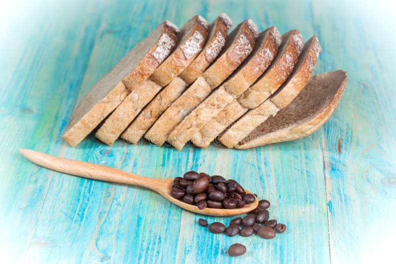 Coffee beans and rye bread stock image. Image of grain - 61897195
