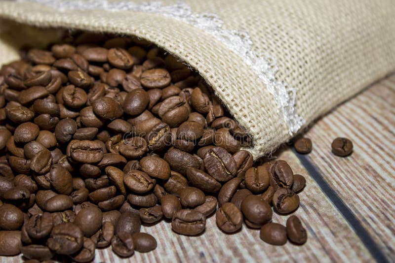 Coffee Beans Spilled Out of the Bag Stock Photo - Image of bean ...
