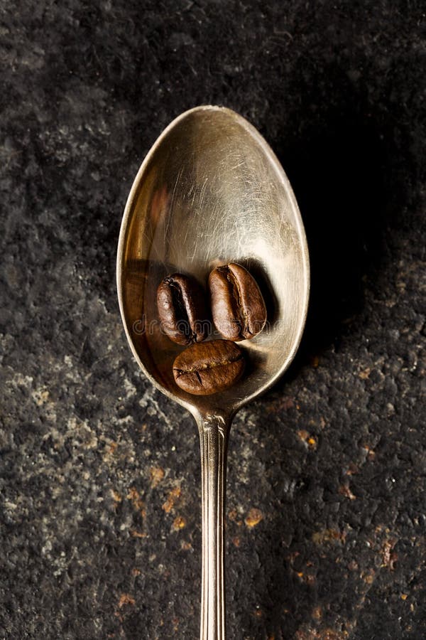 Coffee beans in spoon stock photo. Image of filter, dark - 59727122