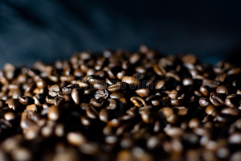 Coffee Beans are Spread Out on the Surface. the Coffee Beans are Brown ...