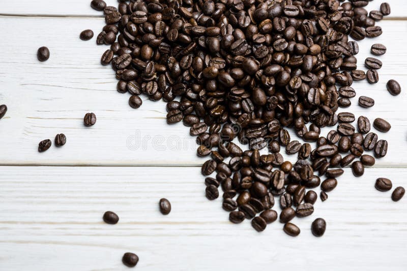 Coffee beans on a table stock image. Image of export - 58189345