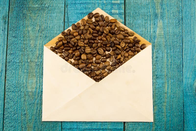 Coffee beans in envelope stock image. Image of aromatic - 20354307