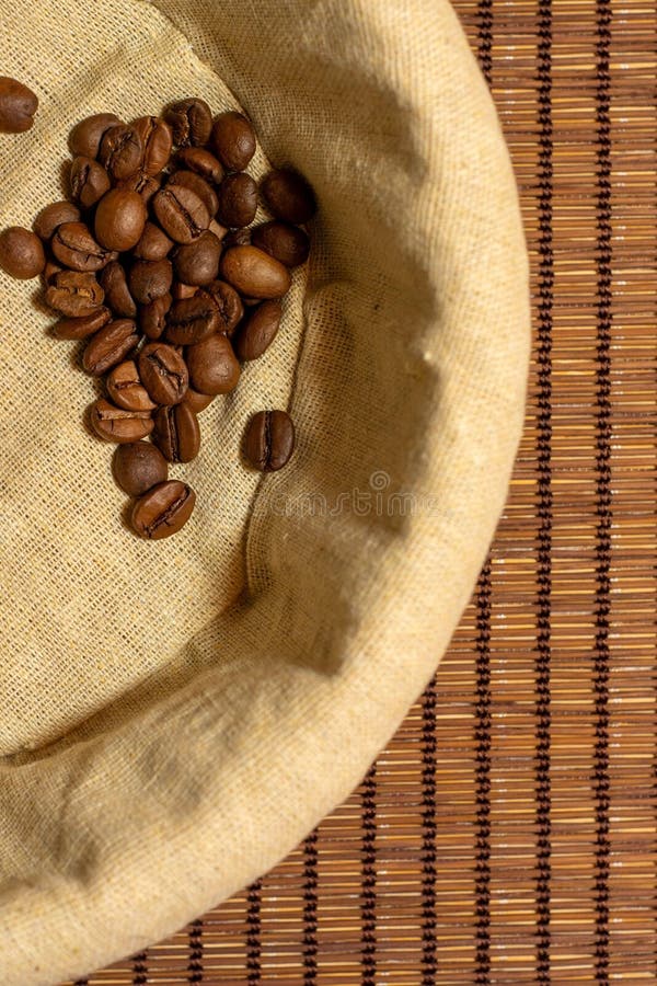 Coffee Beans in a Woven Basket on a Mat Stock Image - Image of wood ...