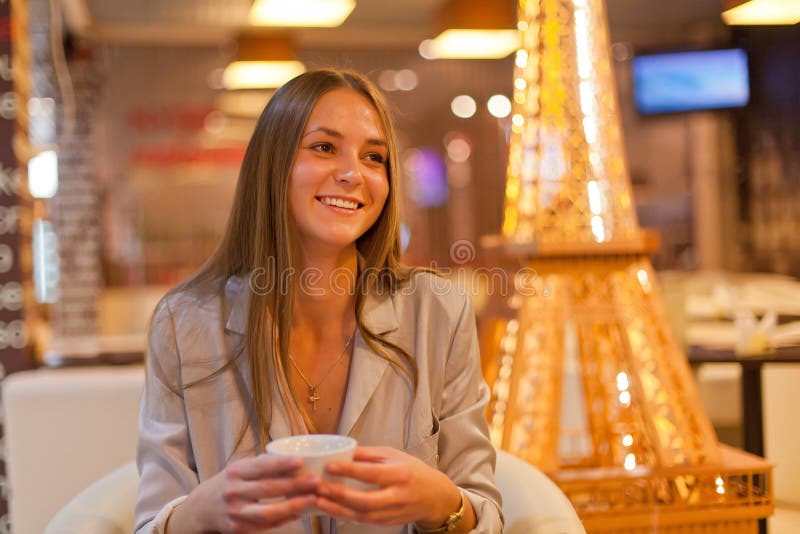 Coffee. Beautiful Girl Drinking Coffee in Cafe. Beauty Model Stock ...
