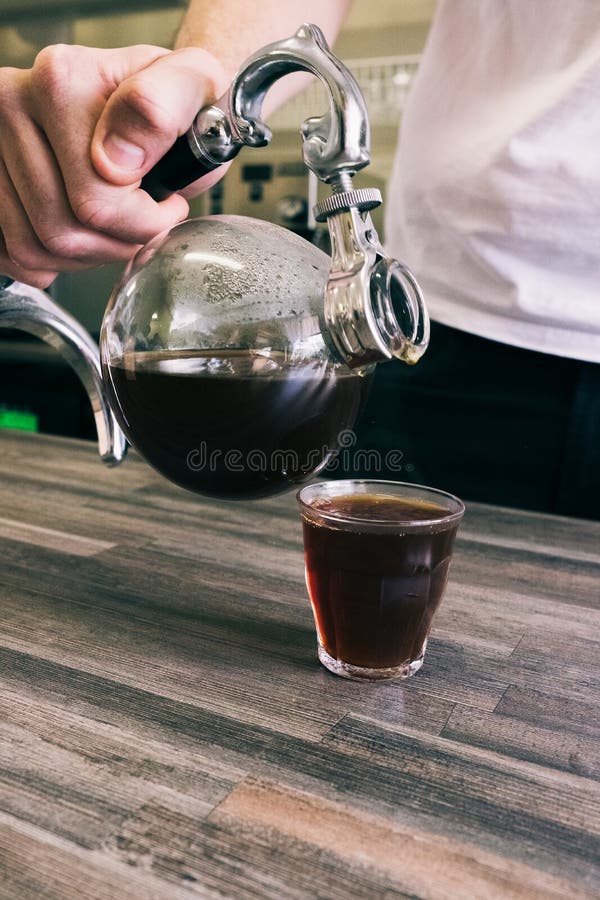 Coffee being poured stock image. Image of home, breakfast - 206055141
